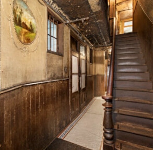 hall-of-tenement – Slippers in the Rain